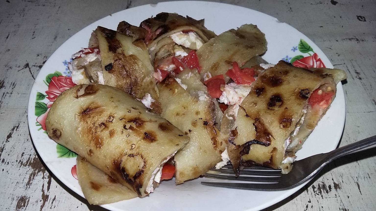 Rolex, the favorite food for many in Uganda, rolled chapati with eggs ...